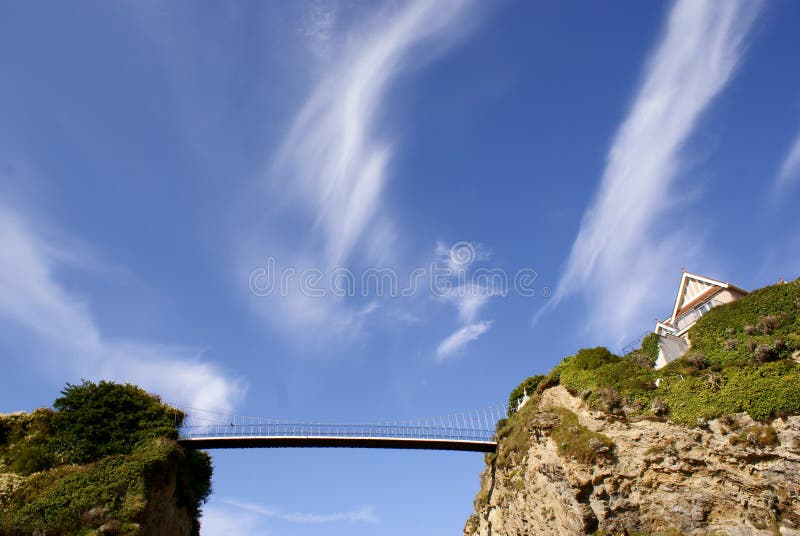 Bridge between two cliffs stock photo. Image of clouds - 39819194