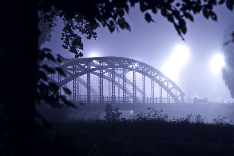 Bridge at night in the fog stock photo. Image of river - 31377466