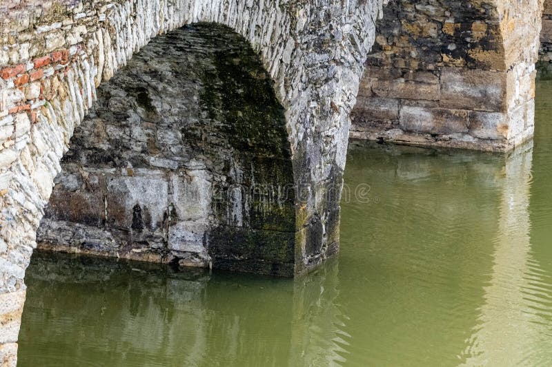 The Bridge from Old Bricks and Stones Above River, Stock Image - Image ...