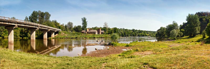 Bridge and Old Buildings on the Spring Riverbank Stock Image - Image of ...