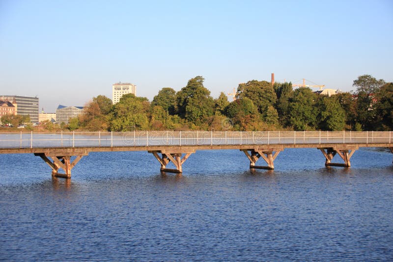 Bridge Over Blue Water in City Lake Stock Photo - Image of lake, pond ...