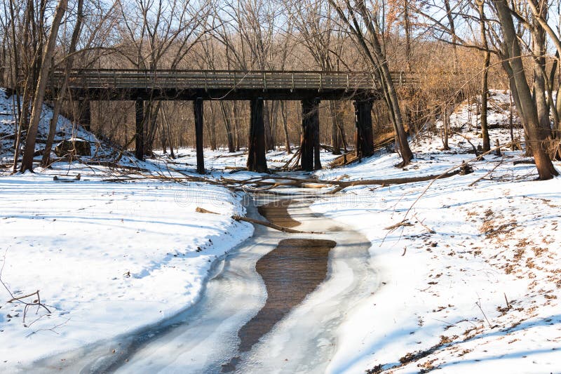 Bridge Over a Brook in Winter Forest Stock Image - Image of woods, flow ...