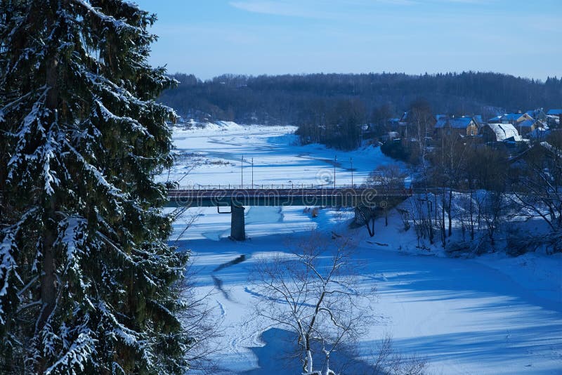 Bridge Over the Frozen River Stock Image - Image of architecture, pass ...
