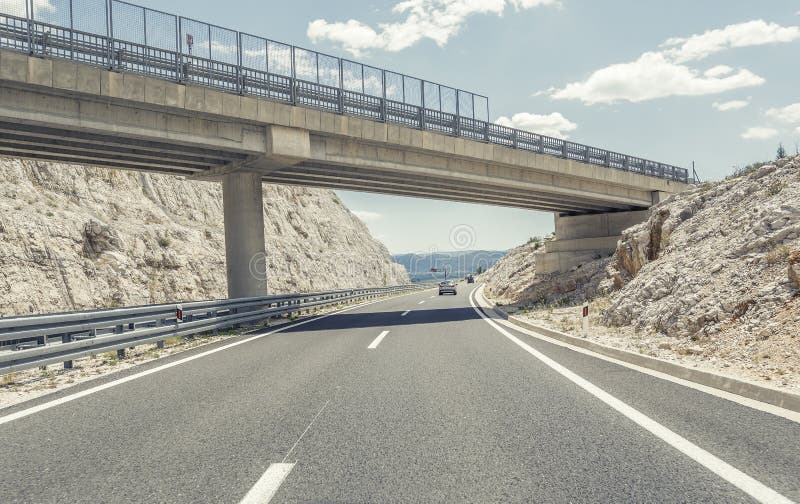 Bridge over a highway. stock image. Image of traffic - 101748445