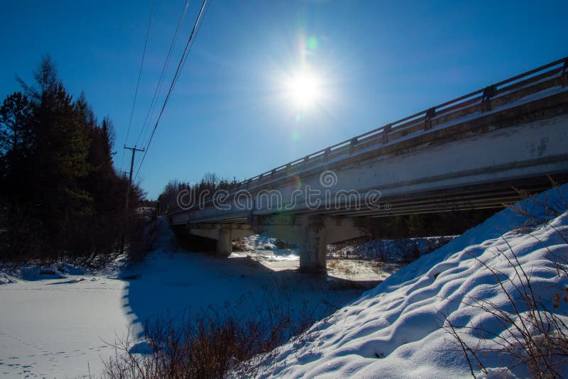 Bridge Over an Icy River in the Canadian Winters in Quebec Stock Image ...