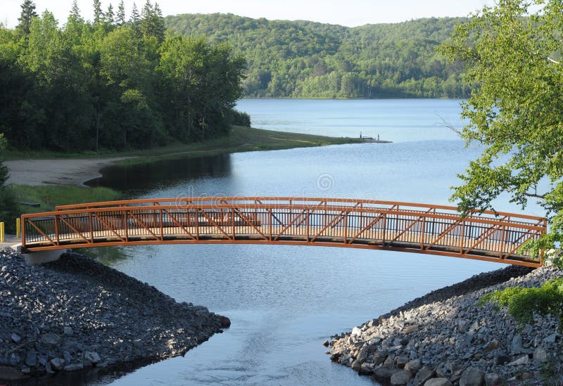 Bridge over a lake stock image. Image of hill, arowhead - 10078489