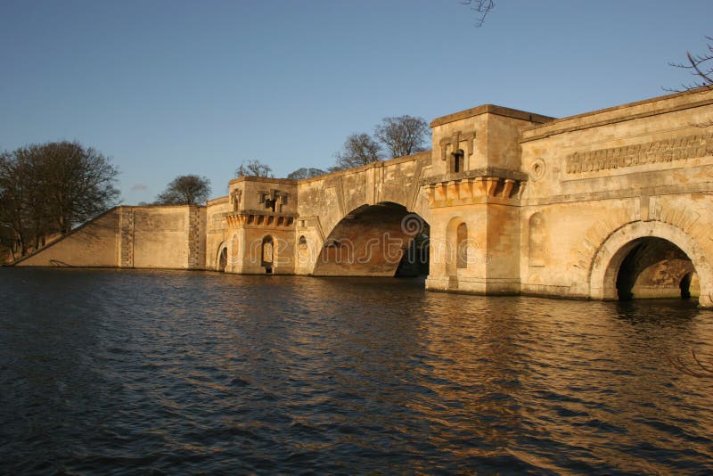 Bridge over the lake stock photo. Image of stonework, golden - 794732
