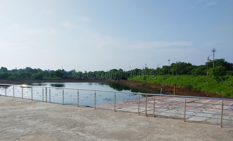 Bridge over a lake stock image. Image of beach, waterway - 182884663