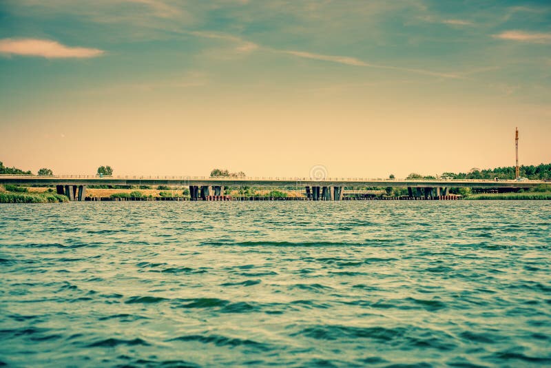 Bridge over a lake stock image. Image of detail, city - 43560329