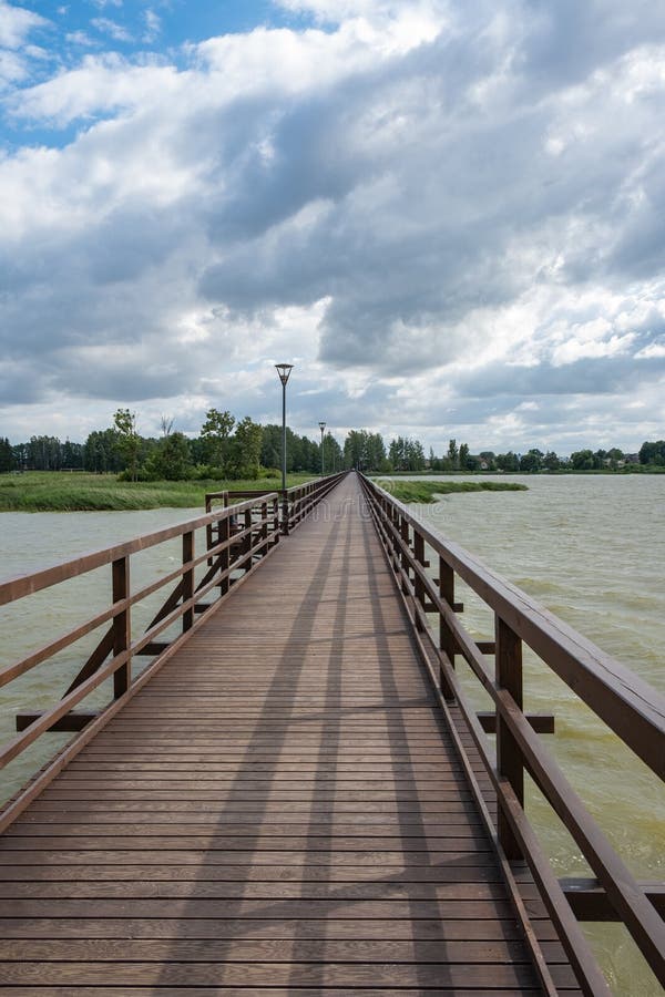 Bridge over the lake stock image. Image of bridge, cloudy - 240523333