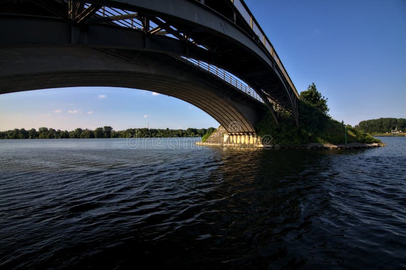 Bridge Over a Lake on a Clear Day Stock Image - Image of colours, clear ...