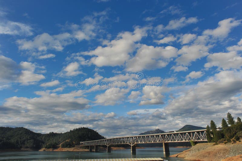 Bridge Over Lake Shasta Under Cloudy Sky Stock Image - Image of forest ...