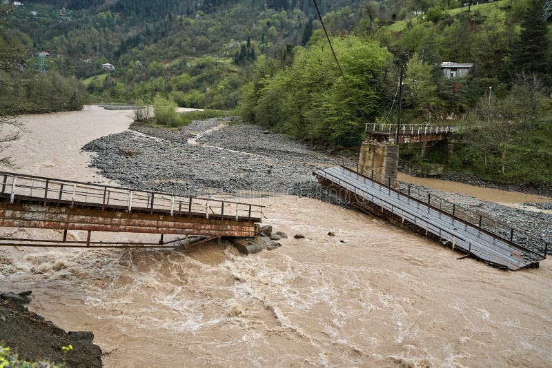 A Bridge Over a Mountain River Destroyed by Water Stock Photo - Image ...