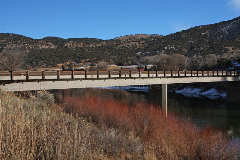 Bridge Over River and Fall Colors Stock Photo - Image of breathtaking ...