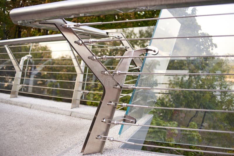 A Bridge Over a River Fenced by a Glass Fence Stock Photo - Image of ...