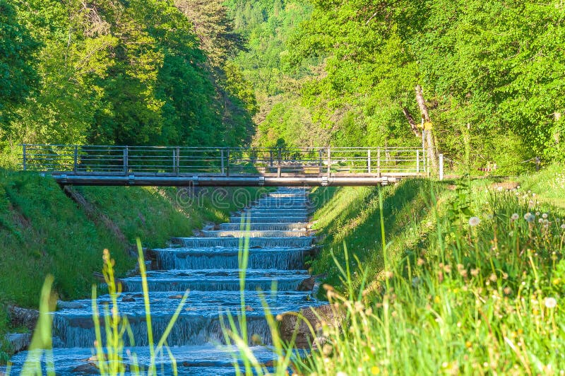 Bridge Over the River of Gryonne Surrounded by Beautiful Greenery in ...