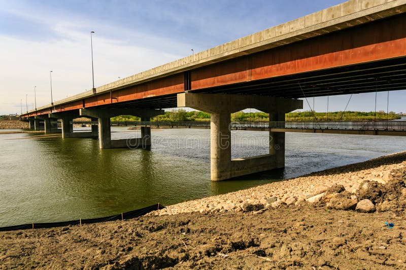 A Bridge Over a River with a Lot of Rocks and Dirt Stock Image - Image ...