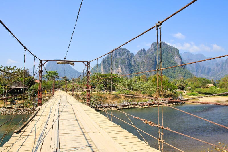 Bridge over Song River stock photo. Image of wood, prabang - 37631876