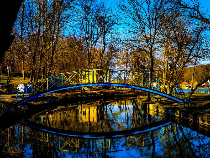 Bridge over water stock image. Image of blue, reflections - 176247477