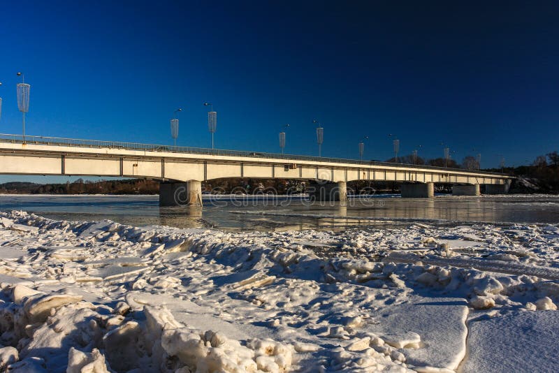 Bridge over winter river. stock photo. Image of outdoor - 69521096