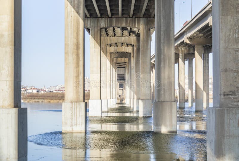 A Bridge Pier Over the River Stock Photo - Image of symmetry, building ...