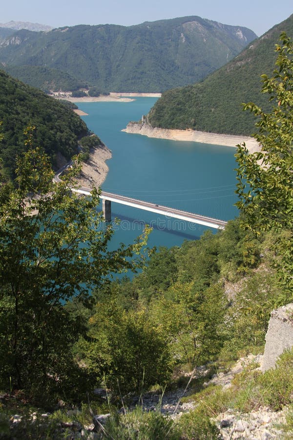 Bridge and Piva lake stock photo. Image of forest, geology - 26432628