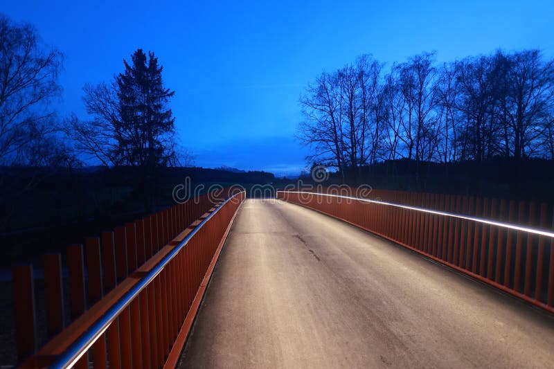 A Bridge with a Railing on the Side of the Road Stock Image - Image of ...