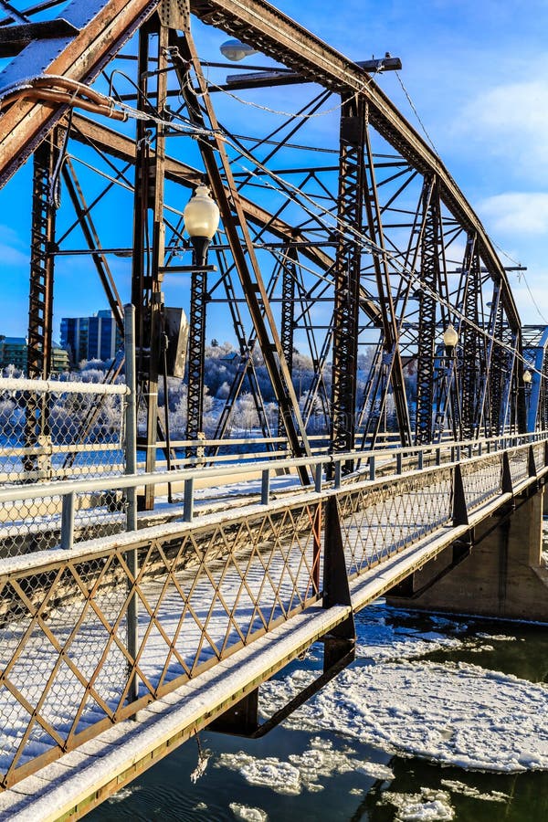 A Bridge with a Railing and a Street Light on it Stock Photo - Image of ...