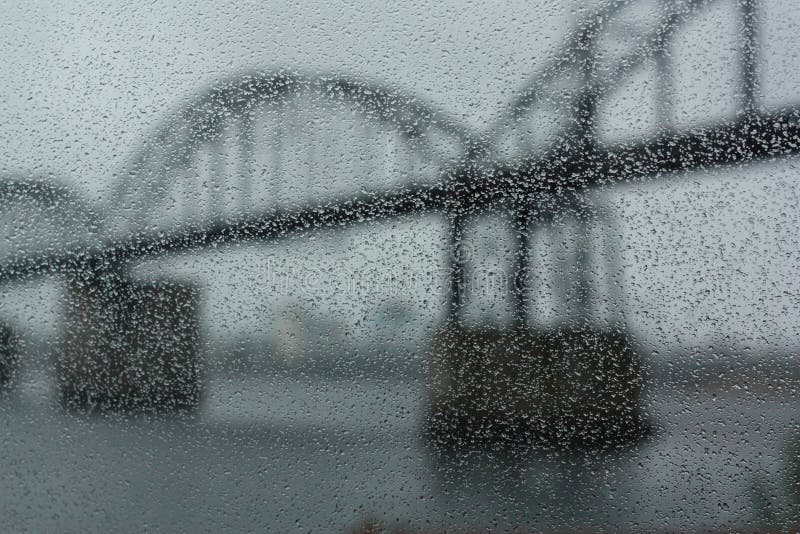 Bridge in a Rain stock photo. Image of window, glass - 54391102