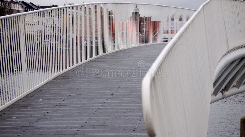 Metal Bridge Over Waterway in Rain Stock Image - Image of span, town ...