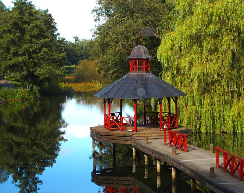 Bridge with red pavilion stock photo. Image of summer - 65625586