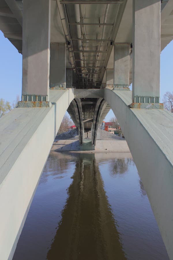Bridge reflection in water stock photo. Image of mirror - 52656144