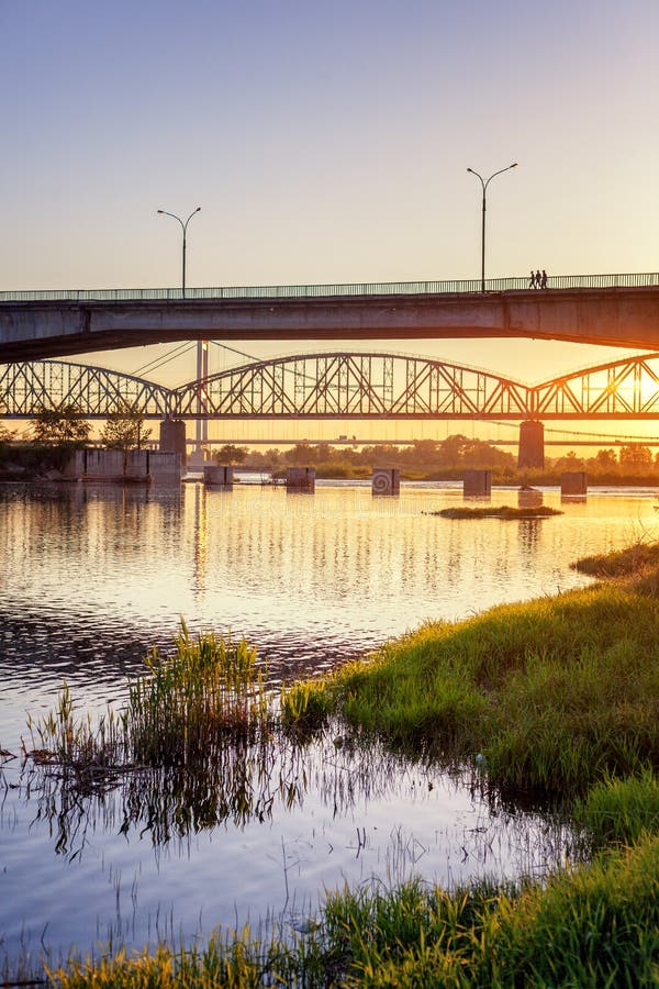 Bridge and River in the Rays of the Setting Sun, Beautiful City Stock ...