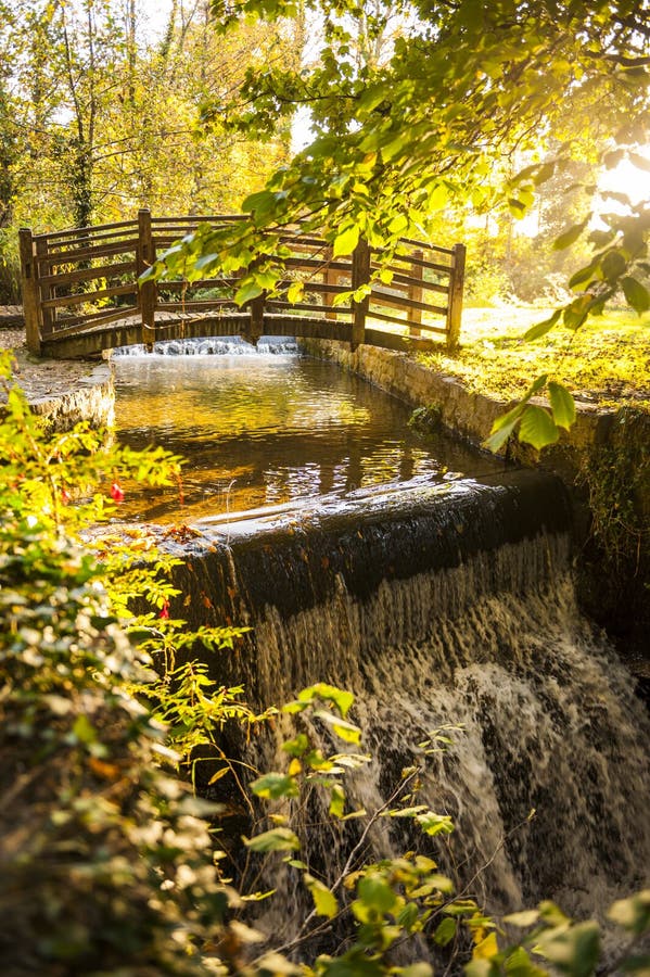 Bridge, river and the sun stock image. Image of autumn - 27462425