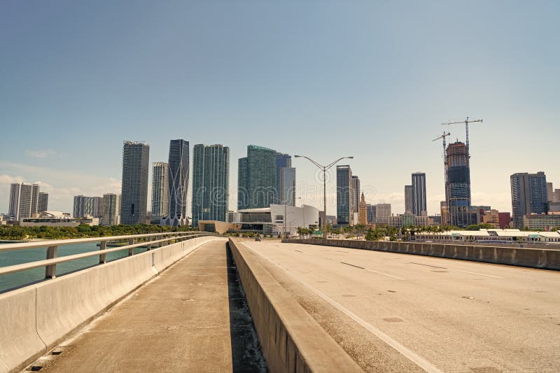 Bridge Road Over River on Urban Skyline Stock Photo - Image of roadway ...