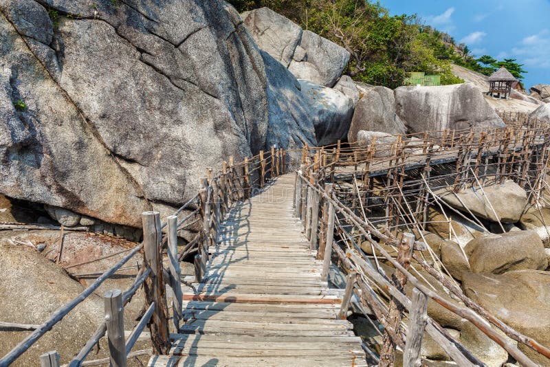 Bridge on the rocks stock photo. Image of footpath, rock - 70823124