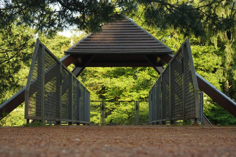 A Bridge with a Roof Over it and a Gate in the Middle Stock Image ...