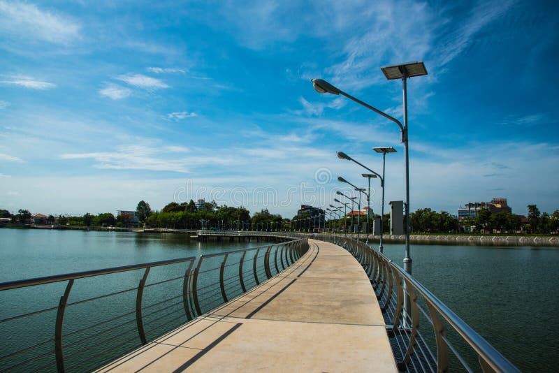 Bridge stock photo. Image of green, lamp, river, season - 97826558