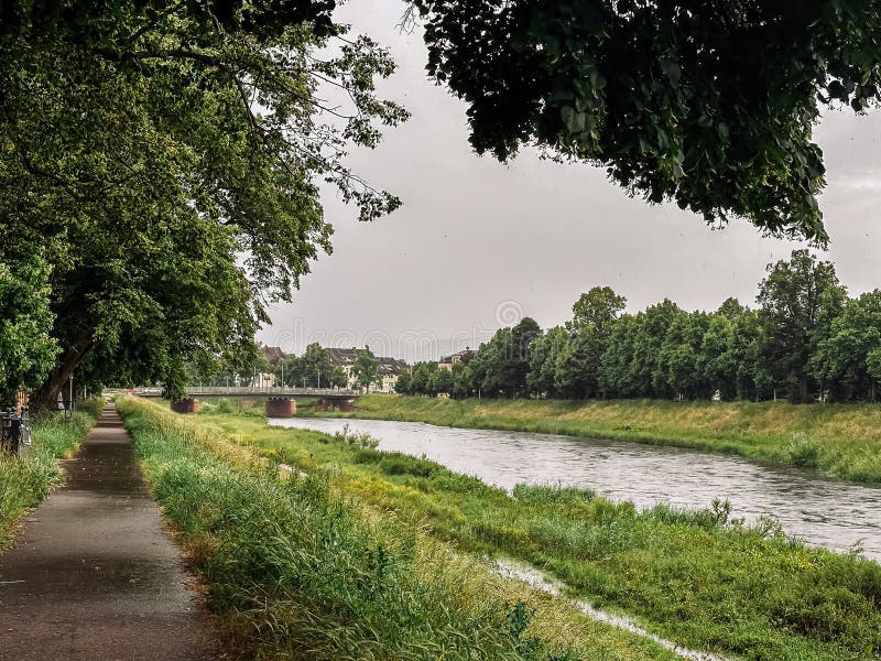 Bridge Spans a River, with a Path Running Alongside it Stock Image ...