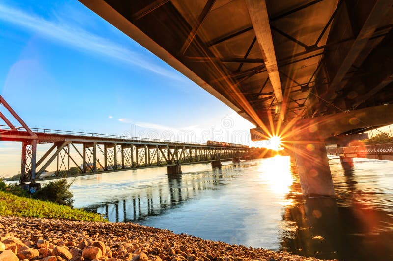 Bridge Spans River Train Passing Underneath Stock Photos - Free ...