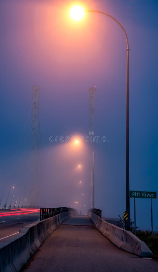 Bridge Street Lights in the Fog Stock Photo - Image of asphalt, blur ...