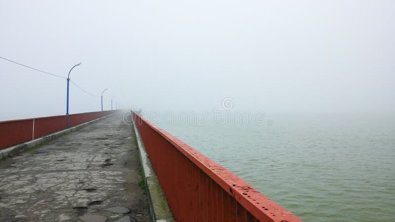 Bridge Stretching into the Morning Fog in Spring Stock Image - Image of ...