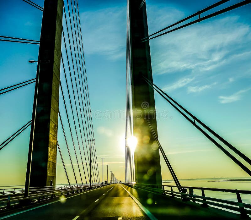 A Bridge with a Sun Shining on it Stock Photo - Image of bridge, sunset ...