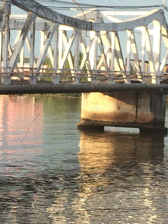 A bridge at sunset stock image. Image of quay, moored - 90018991