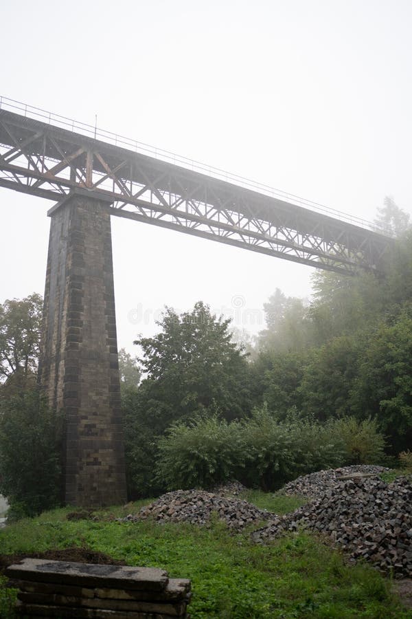 Bridge Surrounded by Dense Trees in Rainy Day Stock Photo - Image of ...