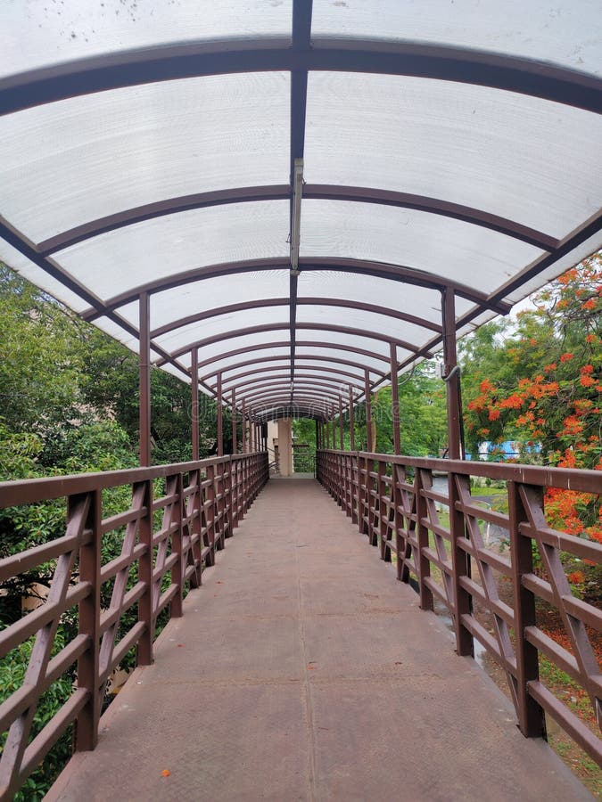 A bridge to next building stock image. Image of pavement - 224080331