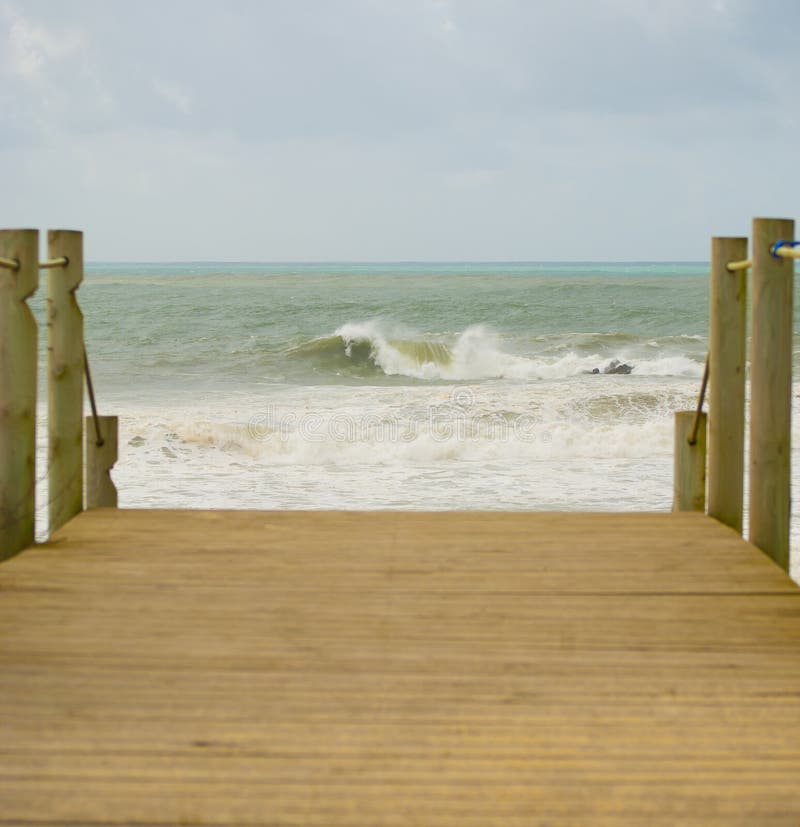Bridge to the sea stock photo. Image of outstretched - 37571780