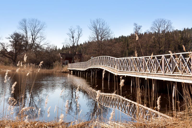 Bridge to the spring. stock photo. Image of spring, house - 19223920