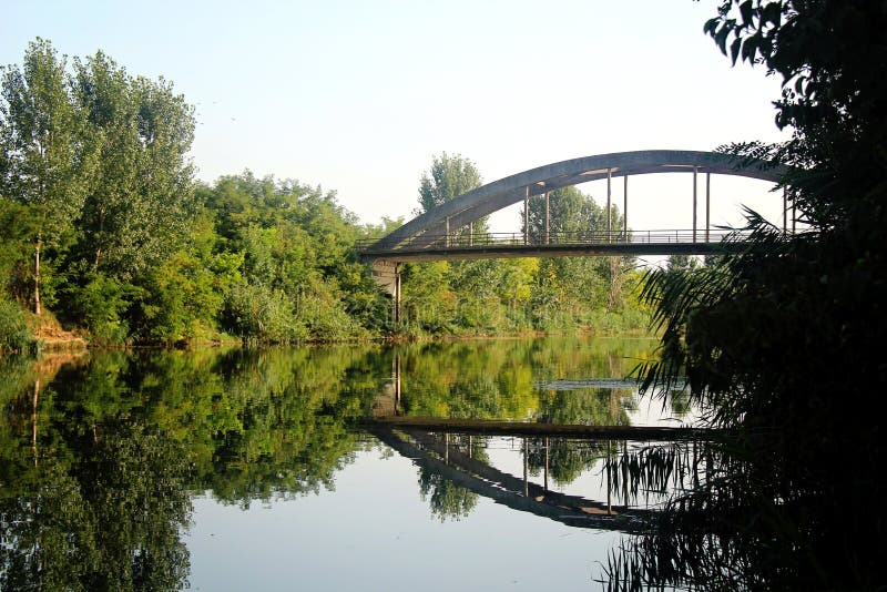 Bridge and Trees Reflecting at Green River Stock Image - Image of ...