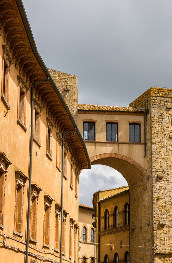 Bridge between Two Historic Buildings in Volterra Stock Photo - Image ...